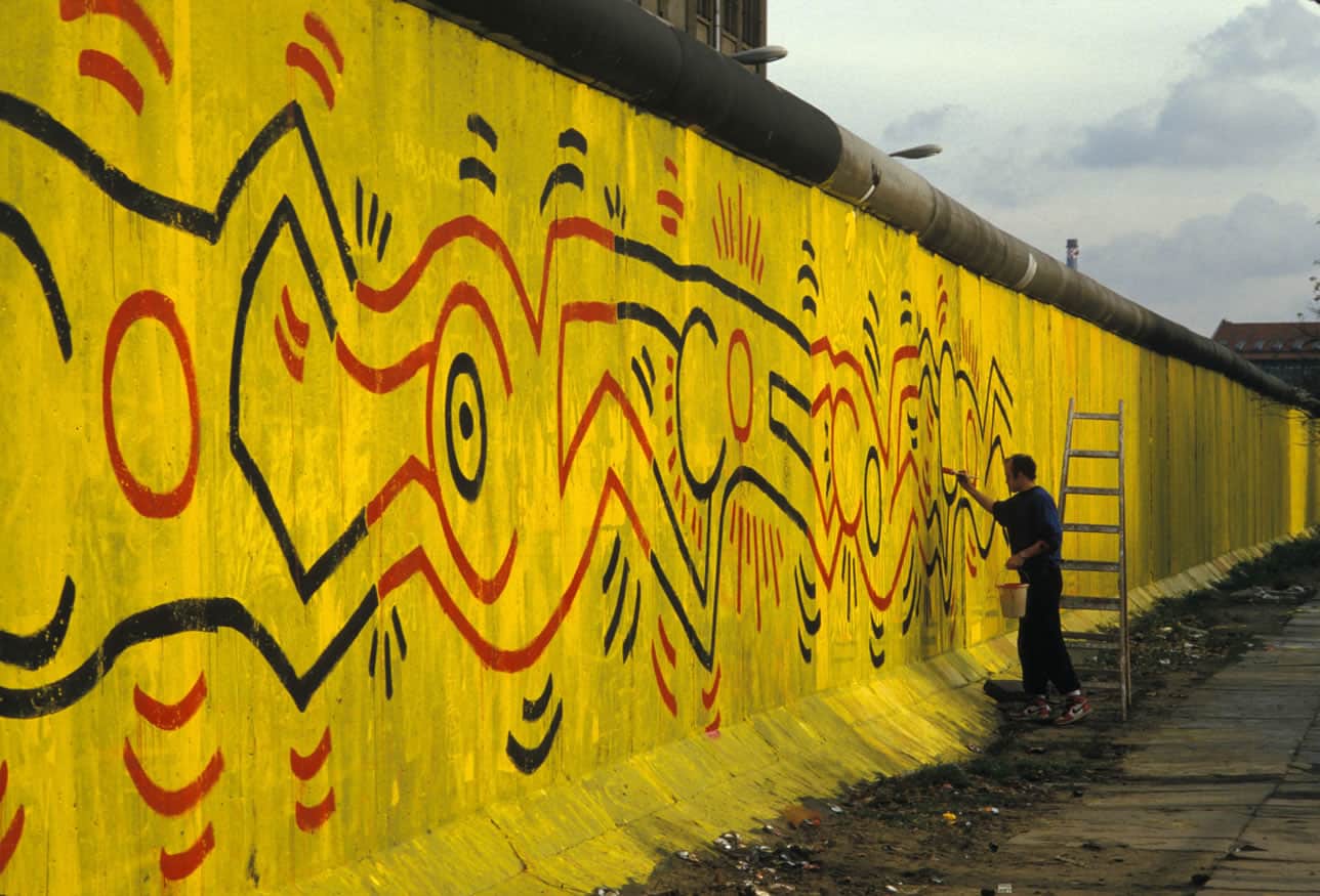 Keith Haring's Berlin Wall Drawings: Art as a Message of Unity and ...